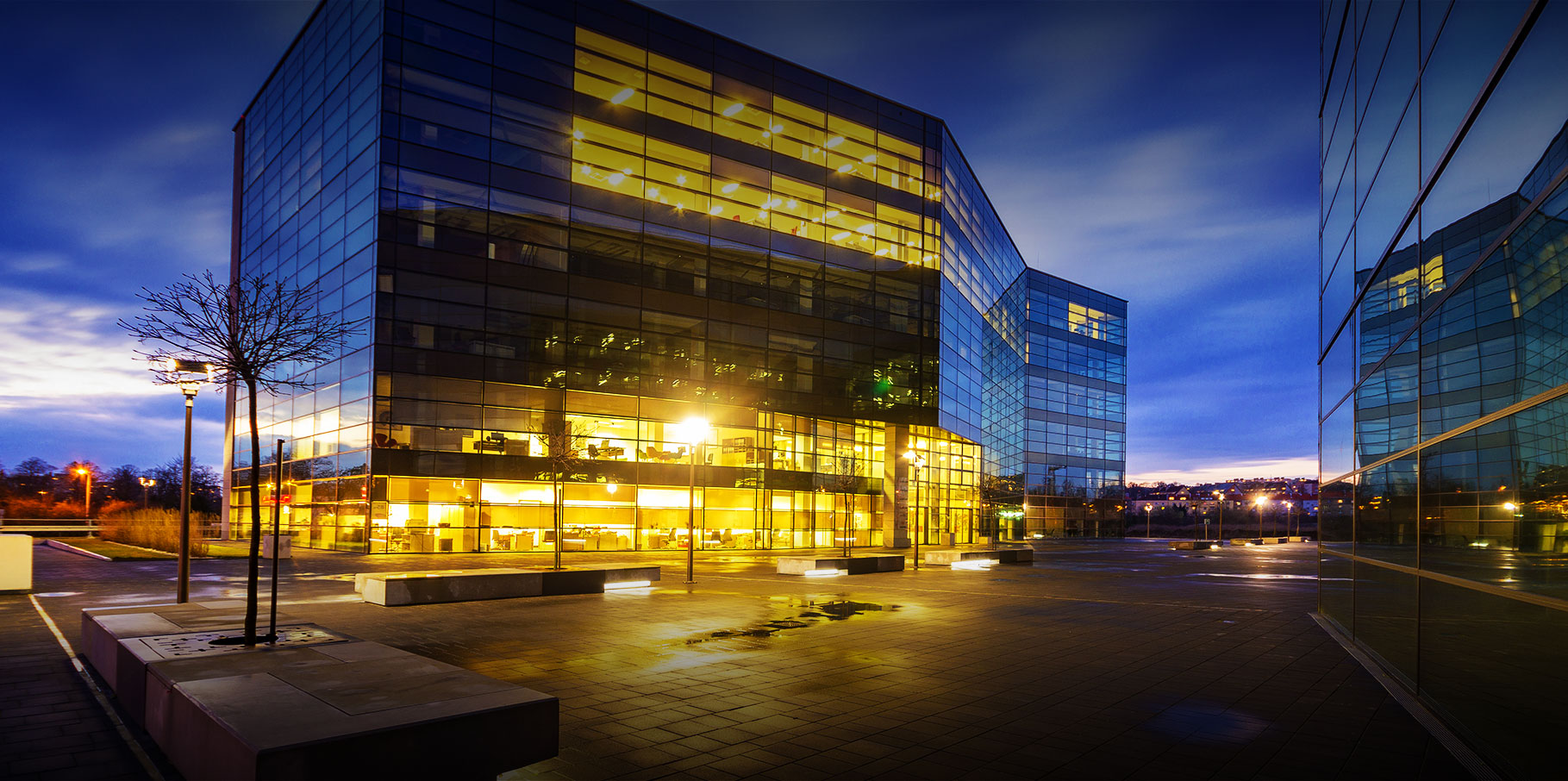 Office-building-at-night | Energy Sub-Metering Solutions, Inc.
